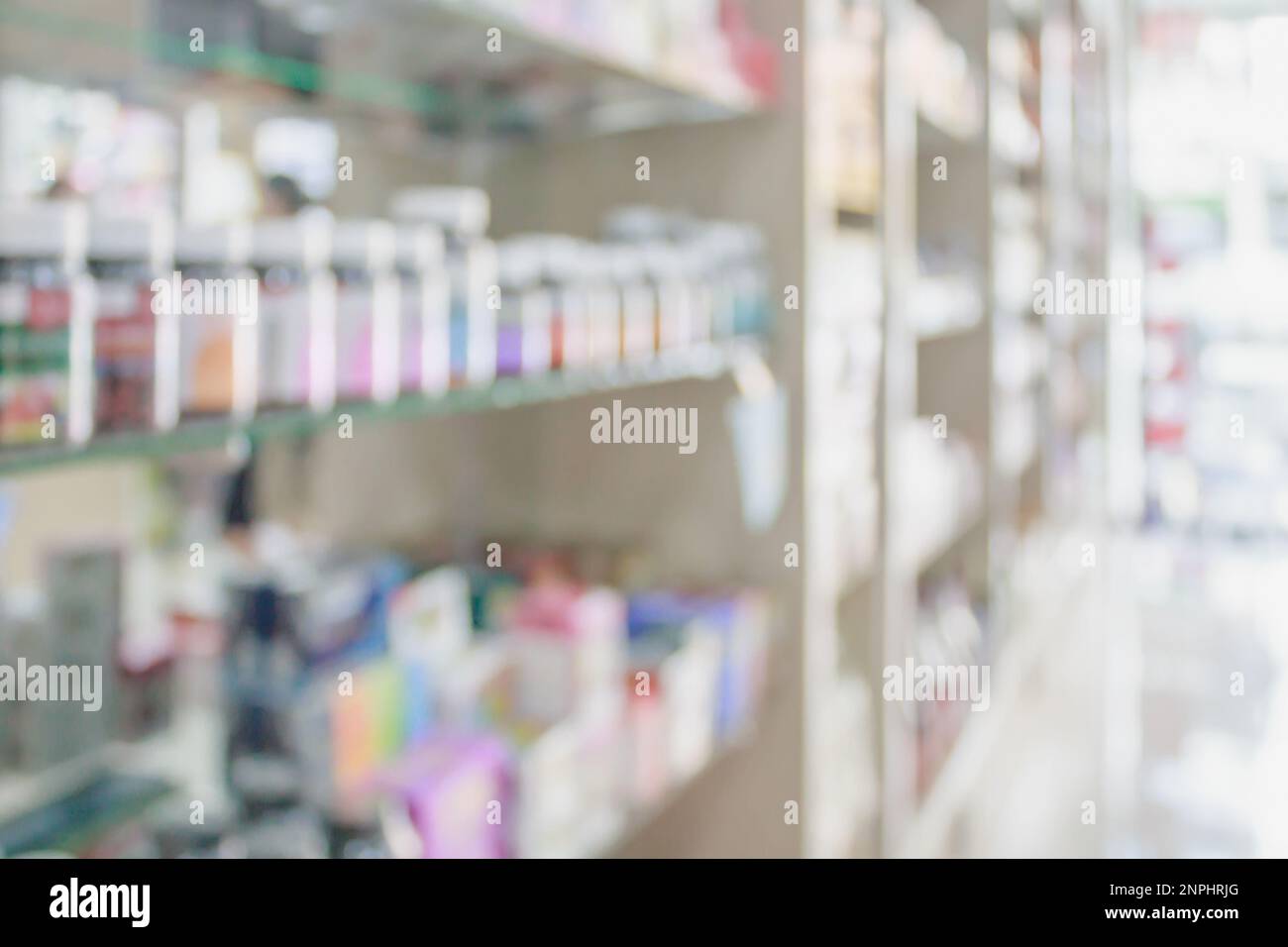 Pharmacy blur background with medicine on shelves Stock Photo - Alamy