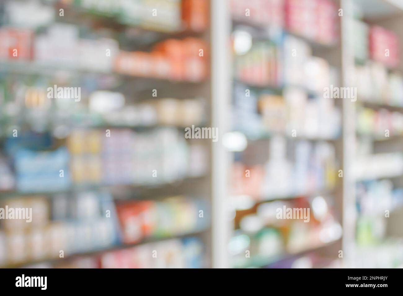 Pharmacy blur background with medicine on shelves Stock Photo - Alamy