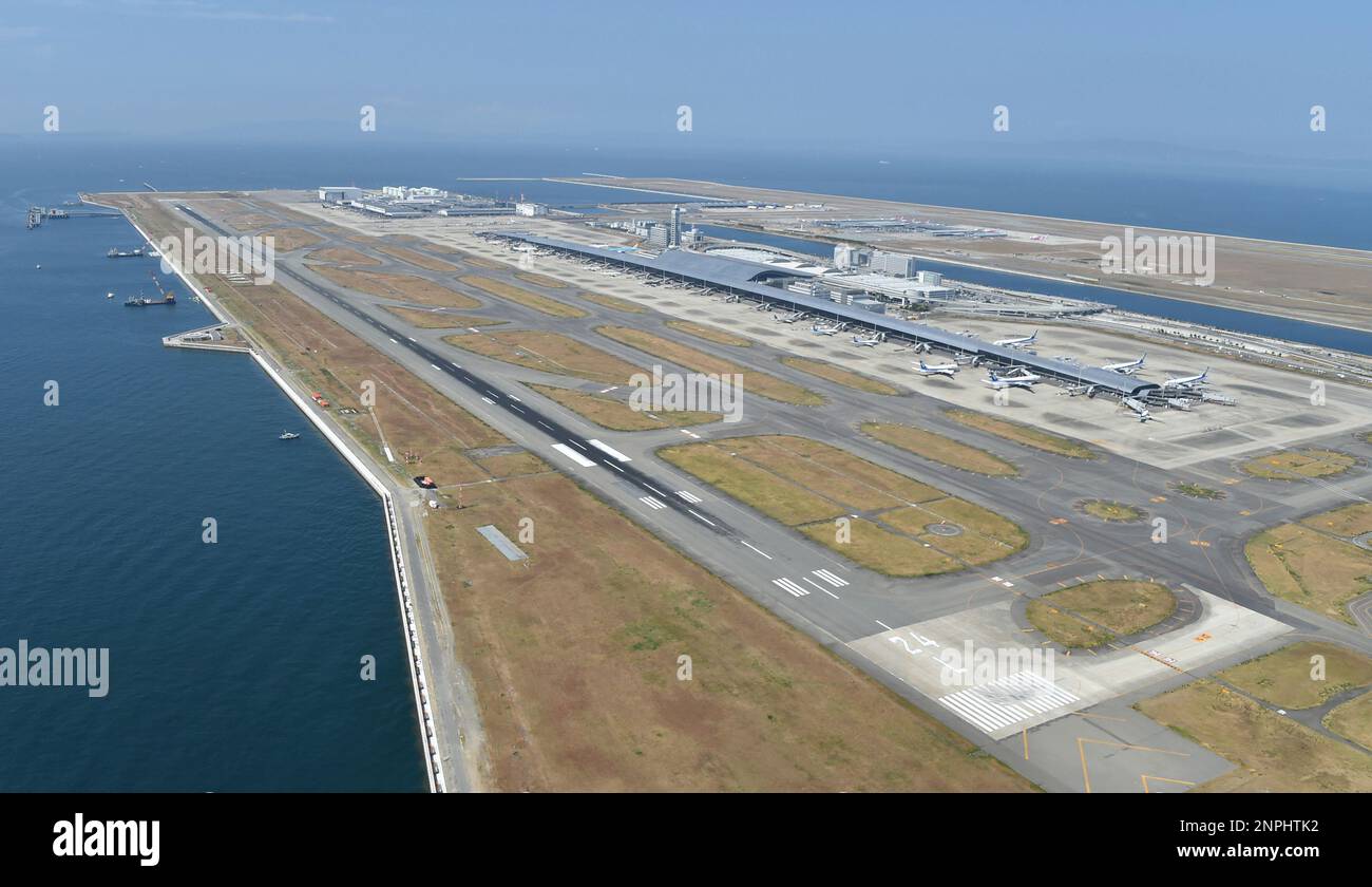 An aerial photo shows the installation work of wave-dissipating block ...