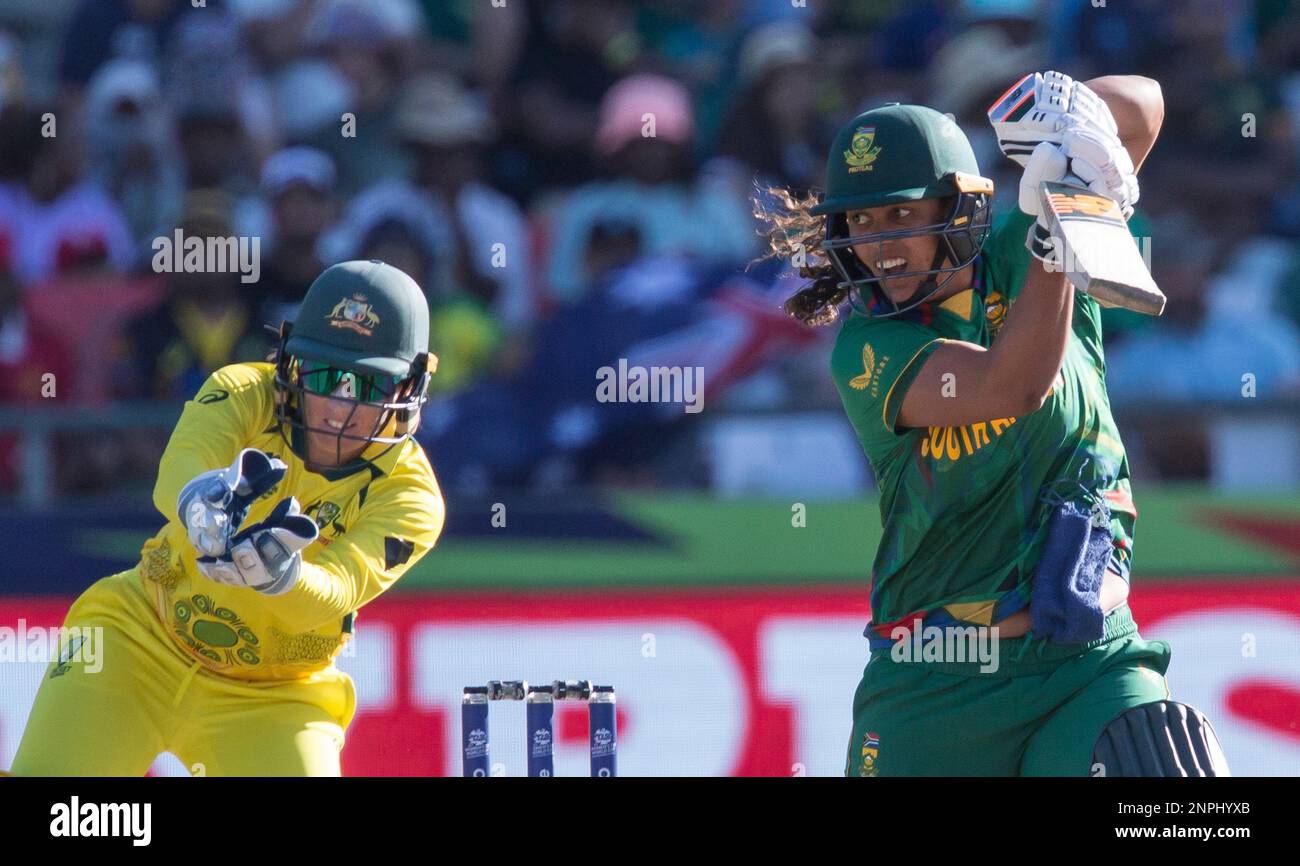 South Africa's Chloe Tryon plays a shot while Australia's Alyssa Healy ...