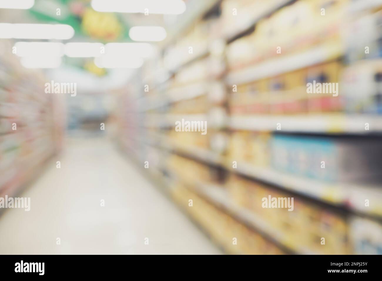 Abstract supermarket aisle shelves blurred background Stock Photo - Alamy