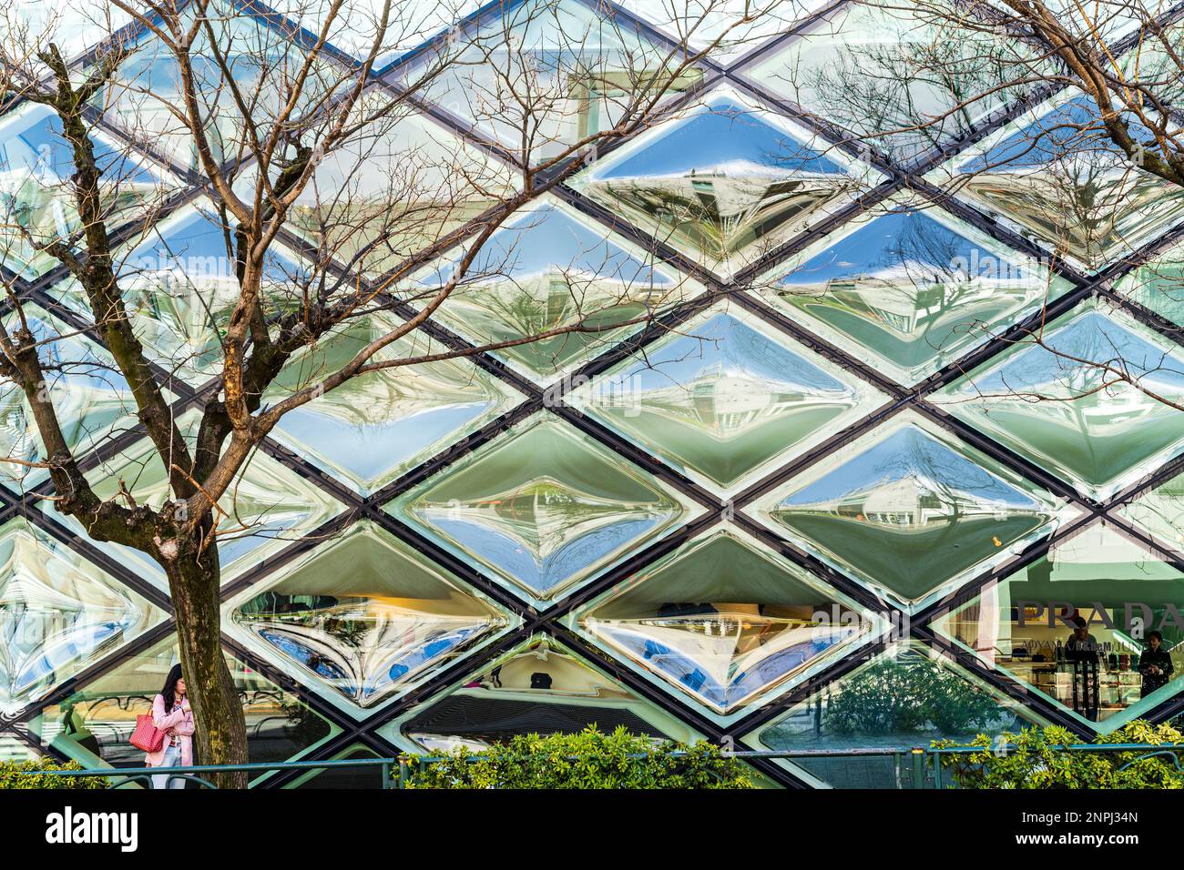 Prada Aoyama store in Tokyo. Six story glass crystal building made from ...