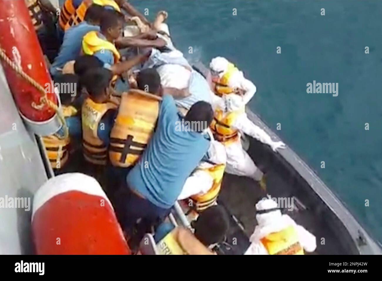 In this image made from video, an injured crew member of the MT New ...