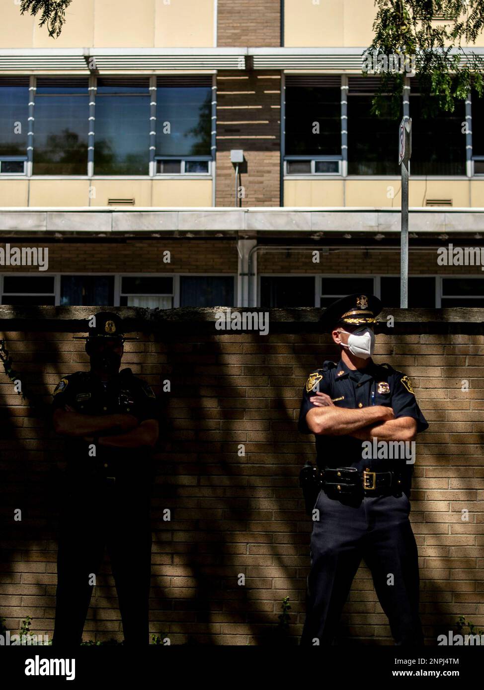 Flint Deputy Chief Devon Bernritter wears a mask as he attends the ...