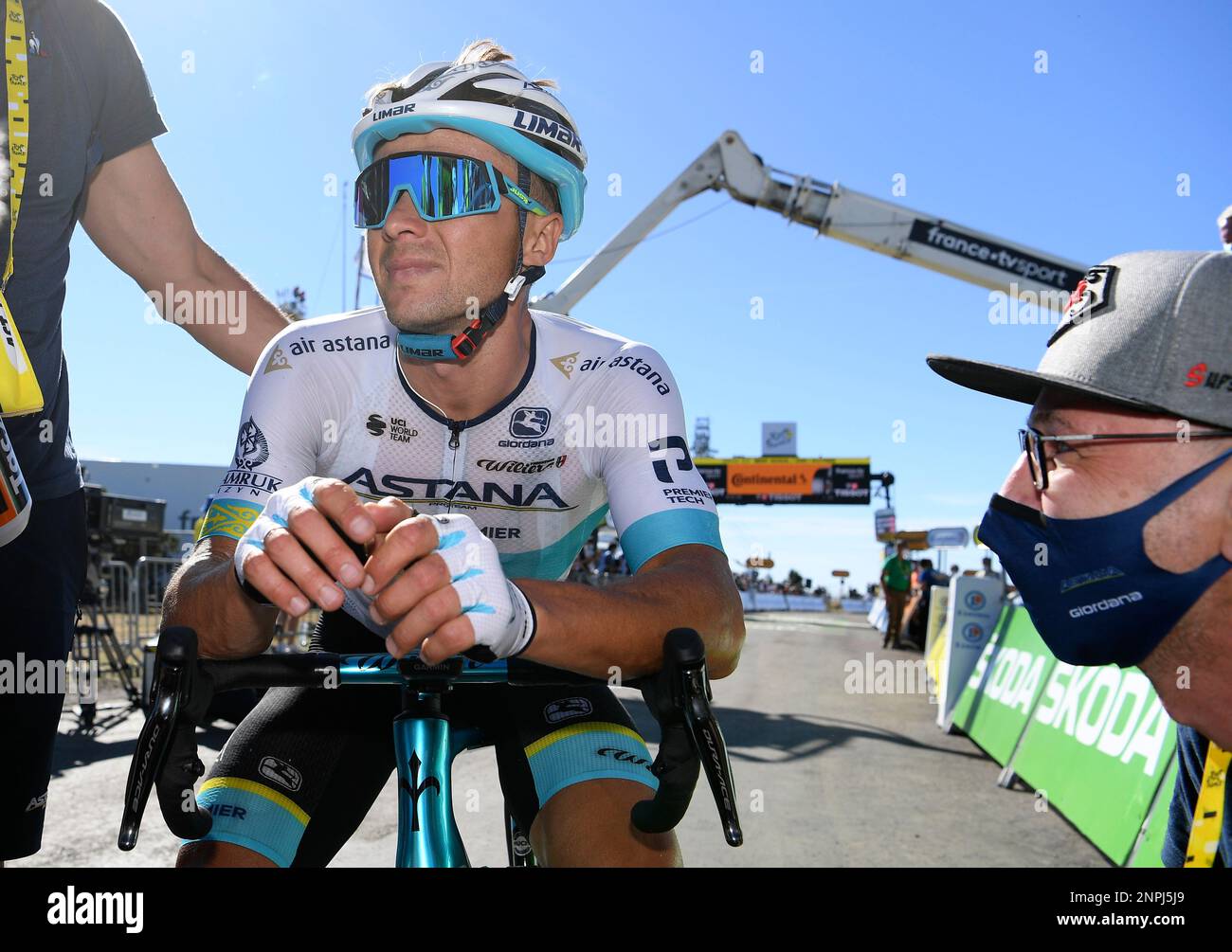 Kazakhstan's Alexey Lutsenko rests after winning the sixth stage of the ...