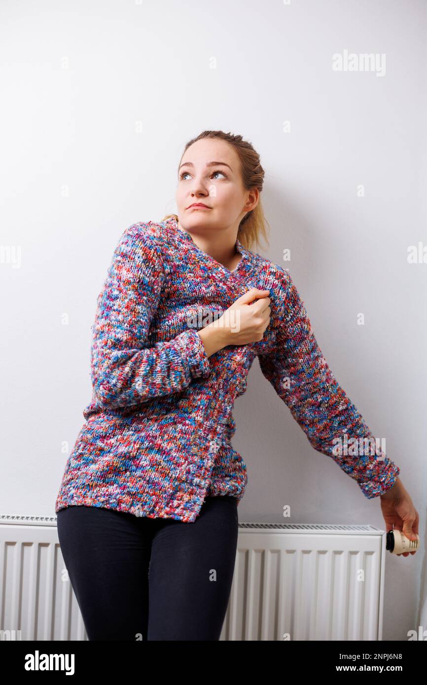 Cold, depressed mid-aged woman at home feeling sad, lonely, anxious ...