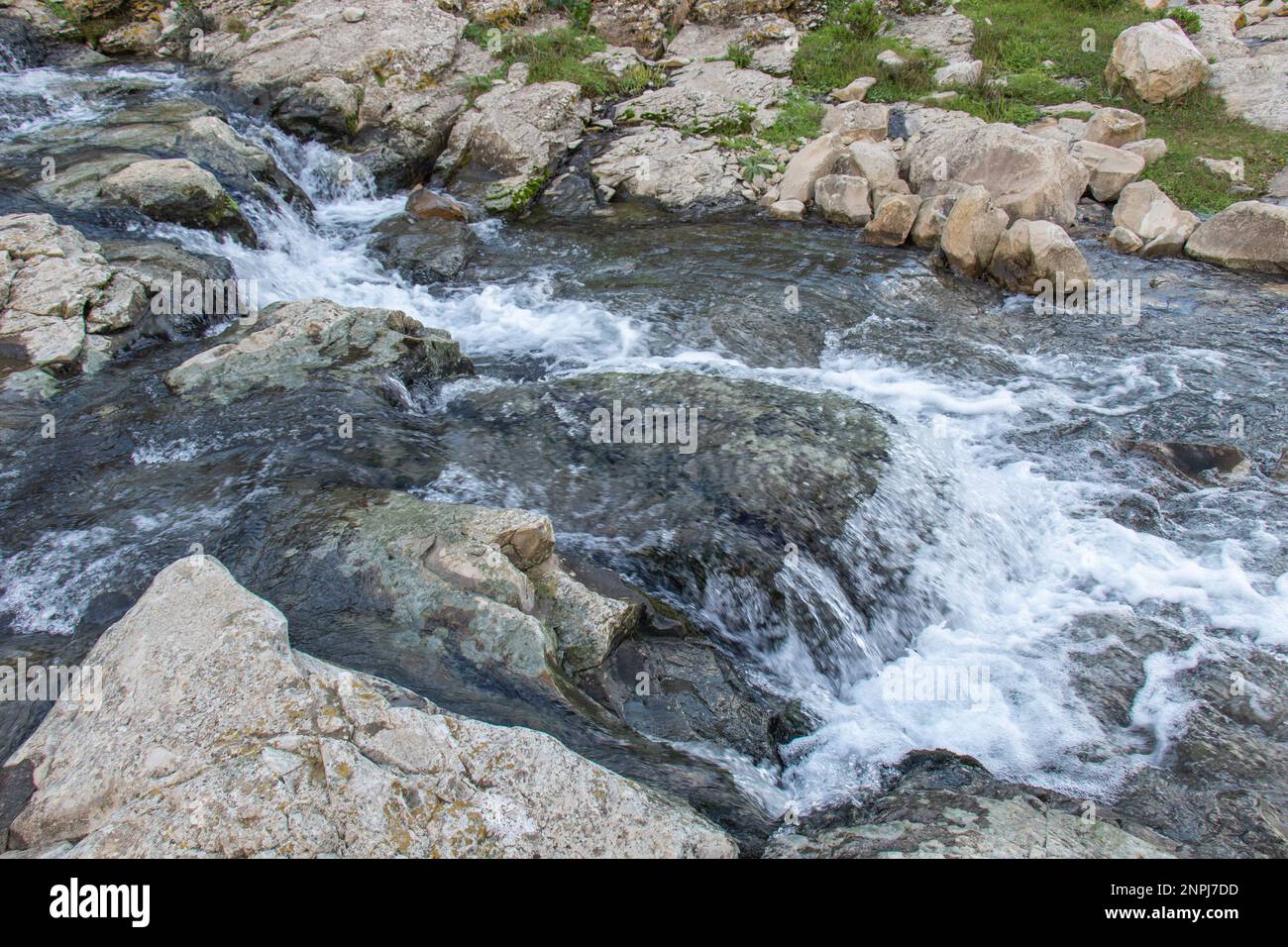 mountain river with clear water and rocks in the mountains of Crimea in Bazina Joumine, Bizerte ...