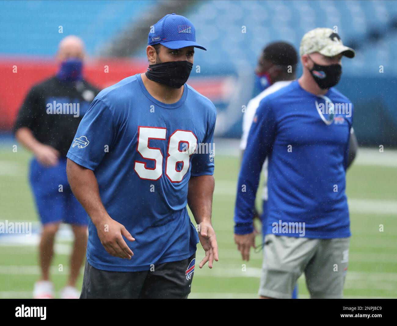 Buffalo Bills linebacker Matt Milano (58) stretches during warm ups at ...