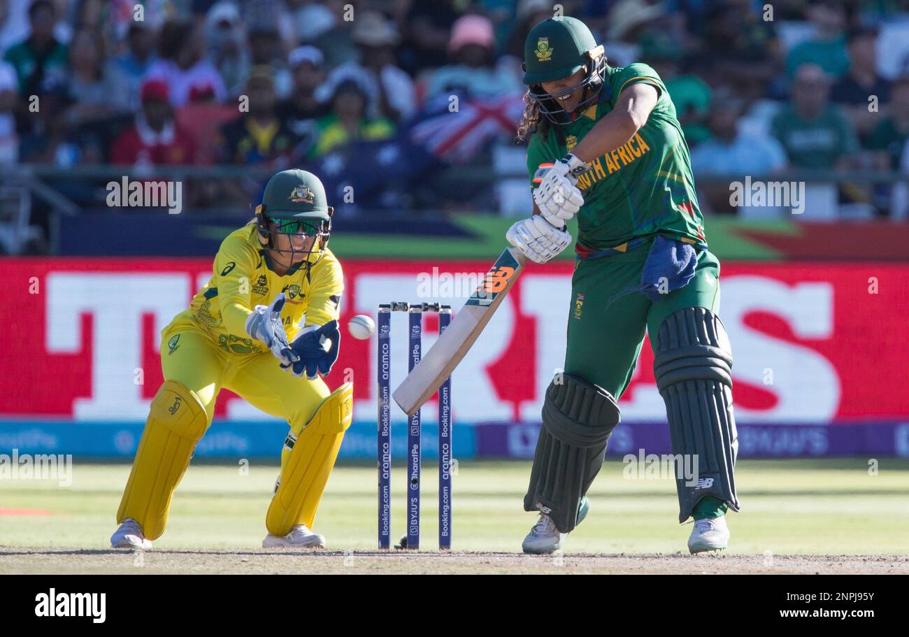 South Africa's Chloe Tryon plays a shot while Australia's Alyssa Healy ...