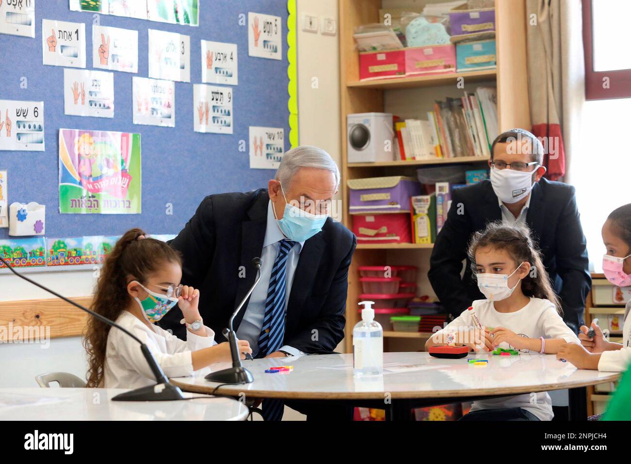 Israeli Prime Minister Benjamin Netanyahu, center left, attends a ...
