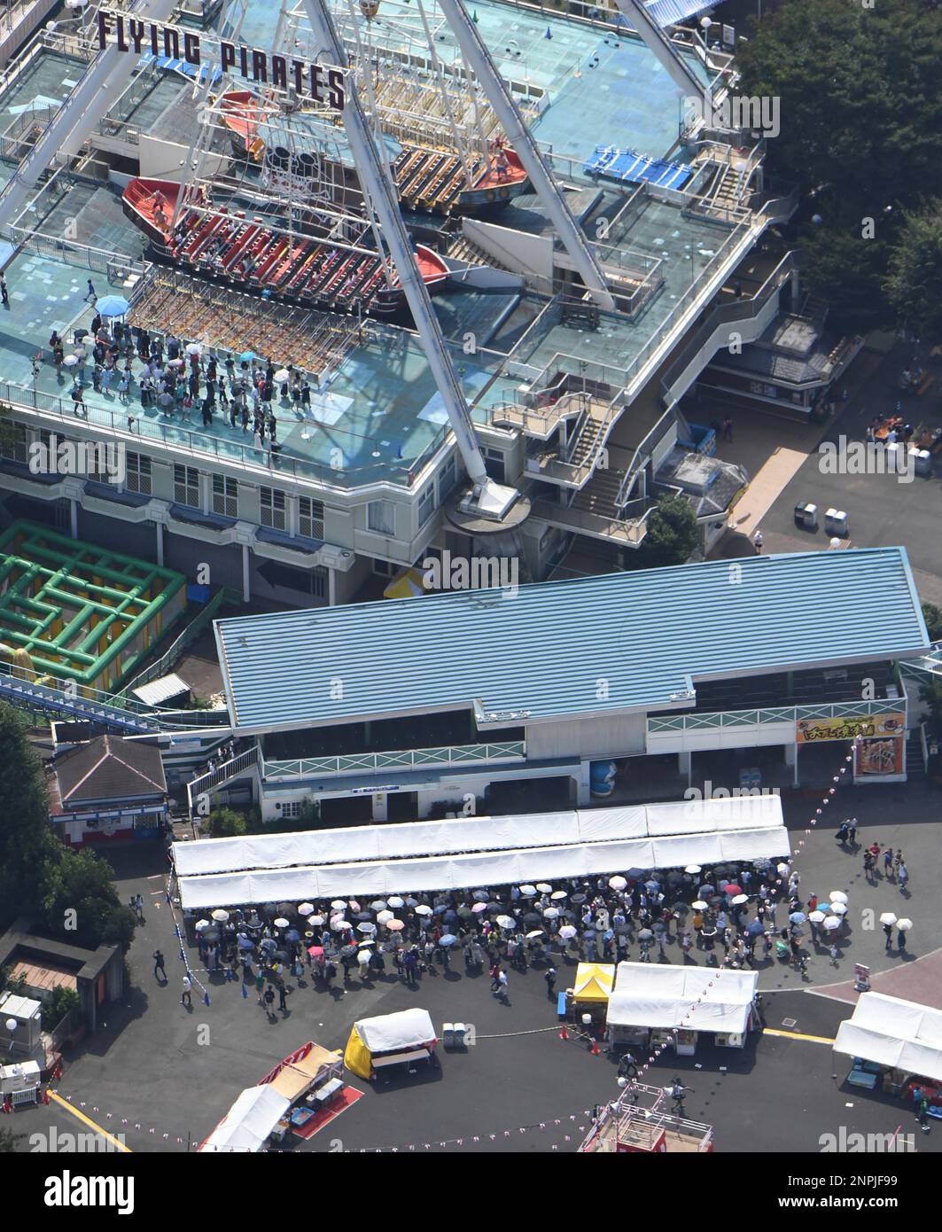 An aerial photo shows a crowd of visitors at Toshimaen amusement park ...