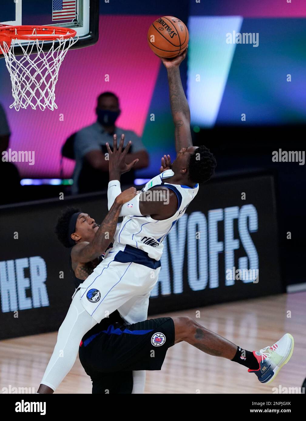 Los Angeles Clippers' Lou Williams (23) fouls Dallas Mavericks' Dorian ...