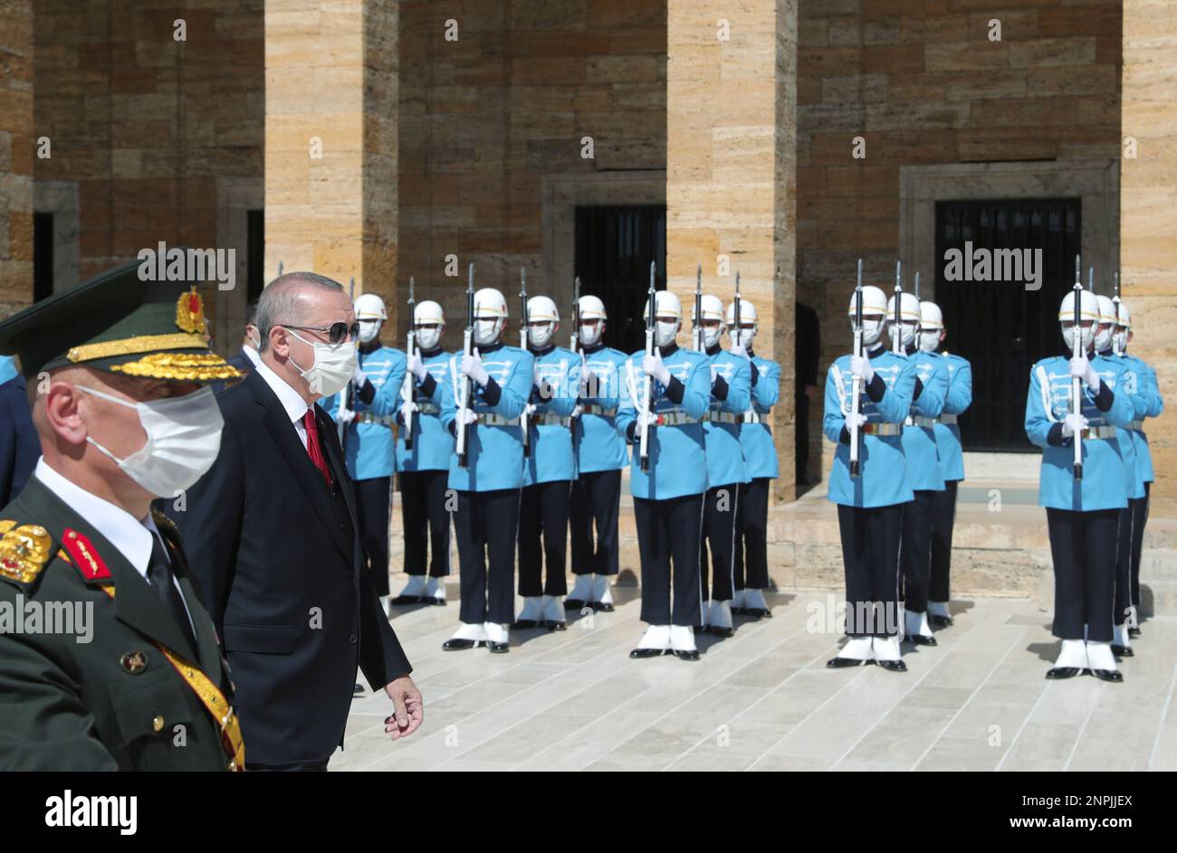 Turkey's President Recep Erdogan, second left, follows a military ...