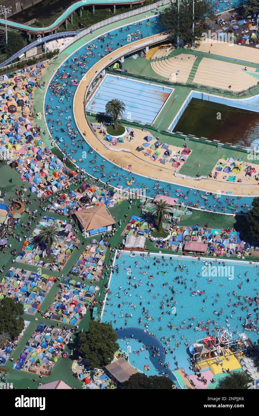 An aerial photo shows crowded pool of Toshimaen in Tokyo on Aug. 30 ...