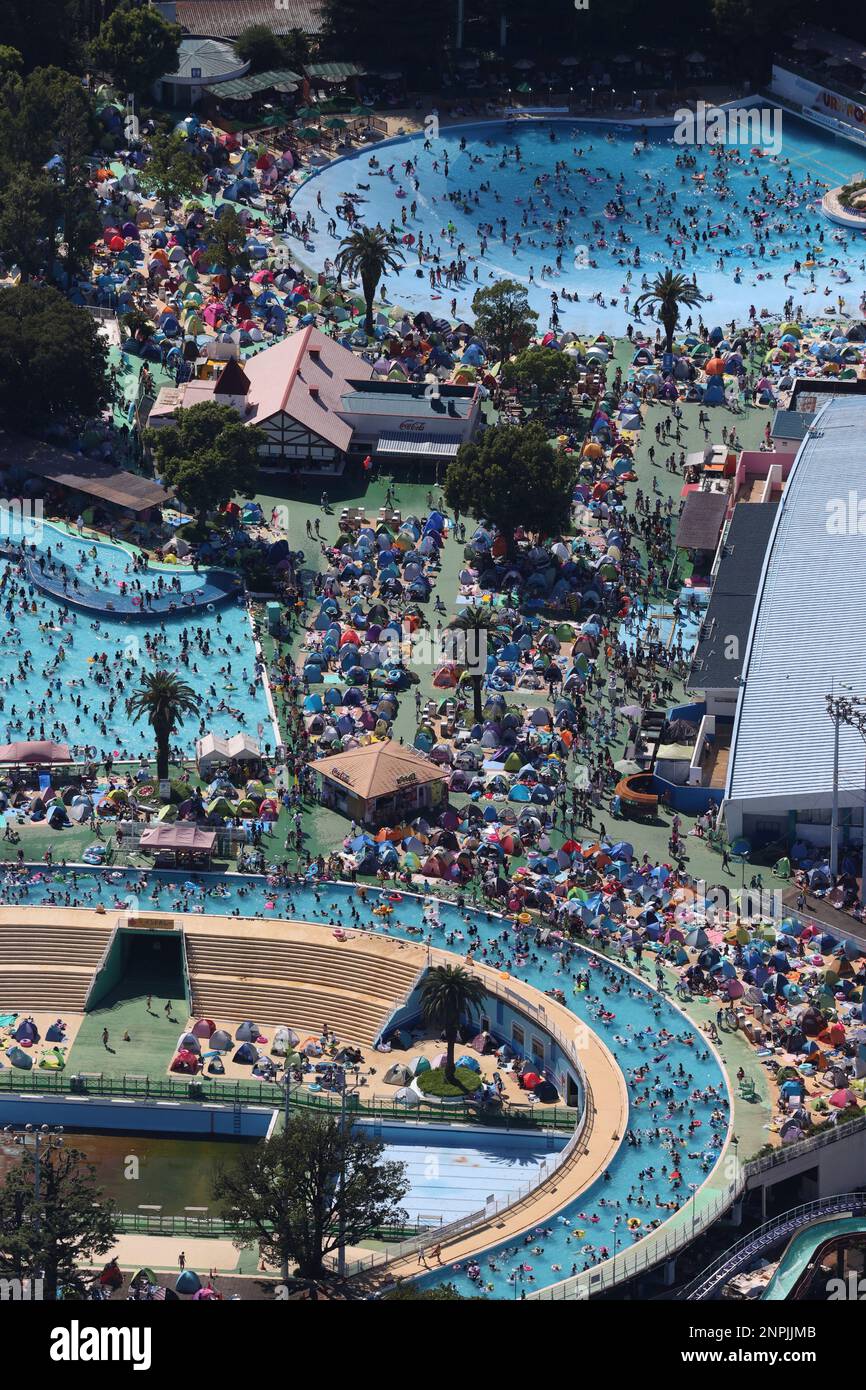 An aerial photo shows crowded pool of Toshimaen in Tokyo on Aug. 30 ...