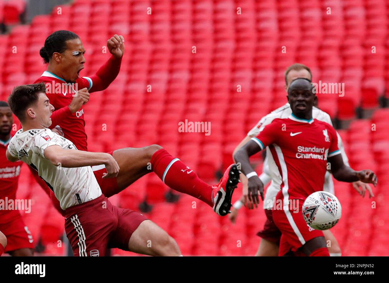 Liverpool's Virgil van Dijk, second left, scores a disallowed goal ...