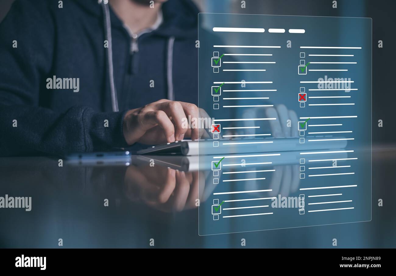 Teen do online exam. Answers on a questions form on virtual screen ...