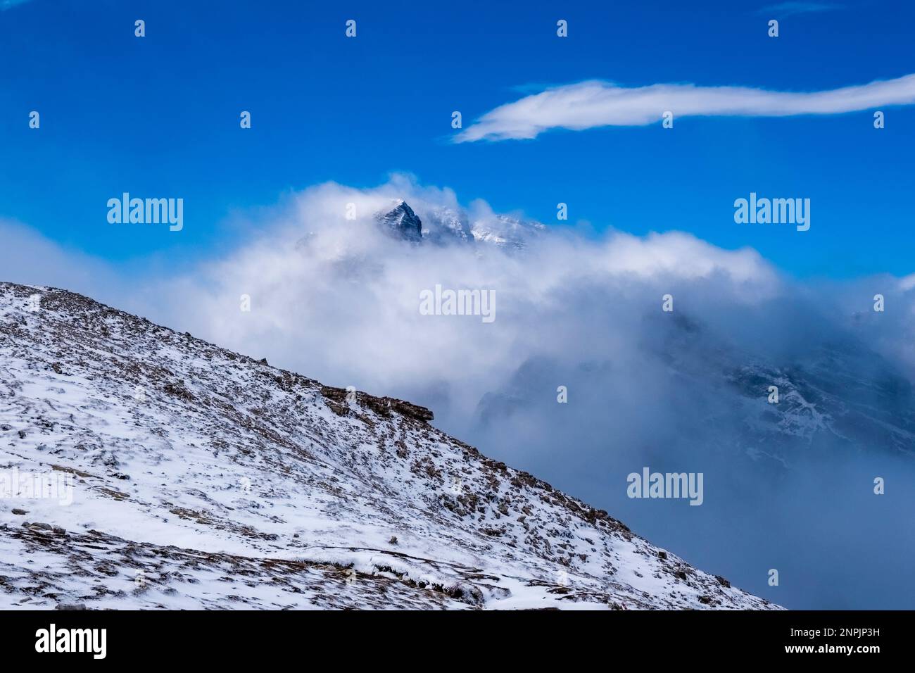 The rocky summits of the mountain Monte Cristallo, partially shrouded ...