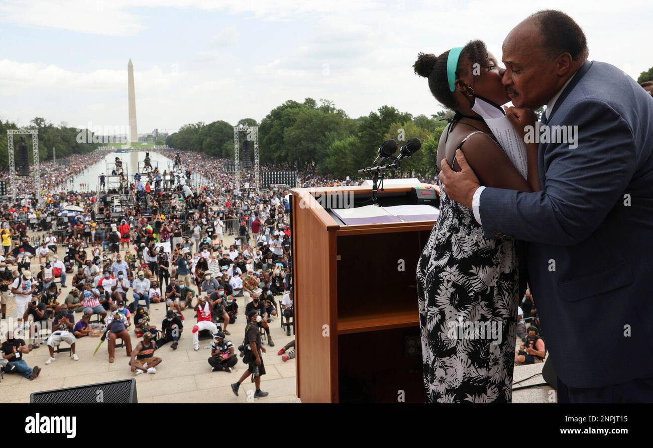 Martin Luther King, III kisses his daughter Yolanda Renee King, after ...