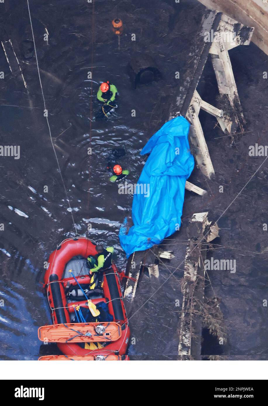 An aerial photo shows the underground oil storage tank remain which ...