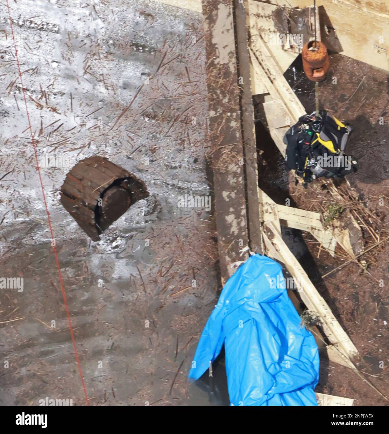 An aerial photo shows the underground oil storage tank remain which ...