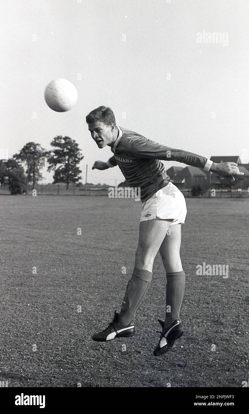 1988, historical, outside on a sports field, a male footballer ...