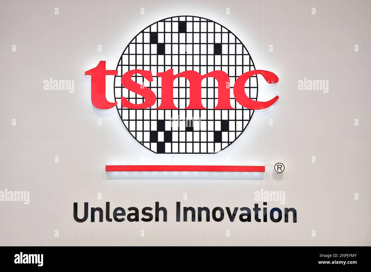 The company logo and slogan of TSMC at the World Semiconductor ...