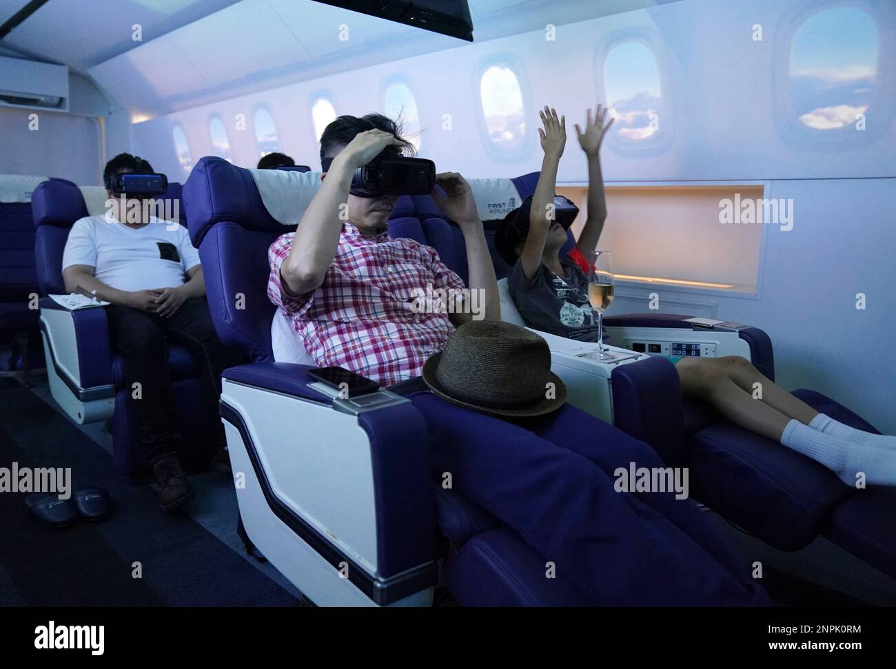 People enjoy flight using virtual reality at FIRST AIRLINES in ...