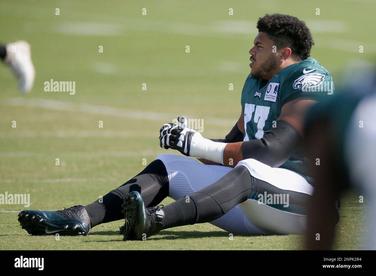 Philadelphia Eagles tackle Andre Dillard (77) stretches during NFL ...