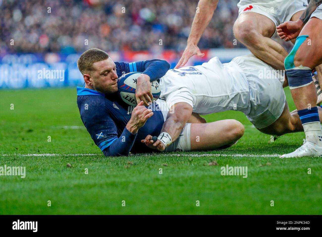 Scotland’s Finn Russell scores a try despite the efforts of France's ...