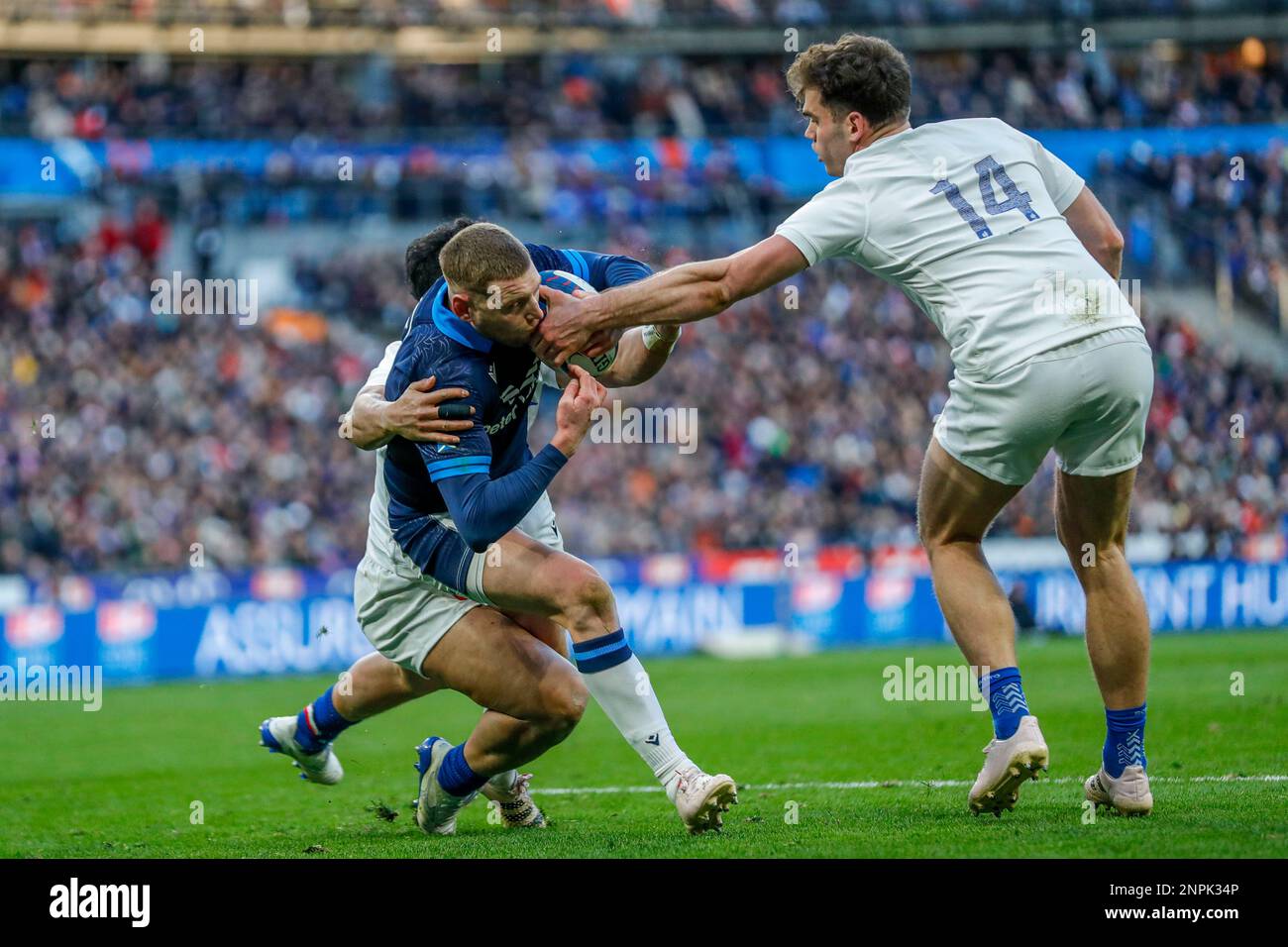 Scotland’s Finn Russell scores a try despite the efforts of France's ...