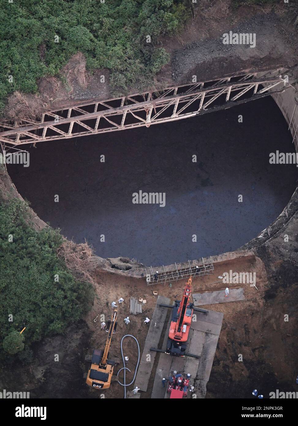 An aerial photo shows an oil tank where a constrction worker fell into ...