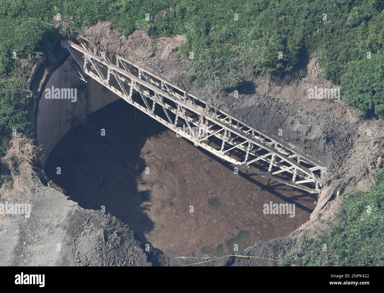 An aerial photo shows an oil tank where a constrction worker fell into ...