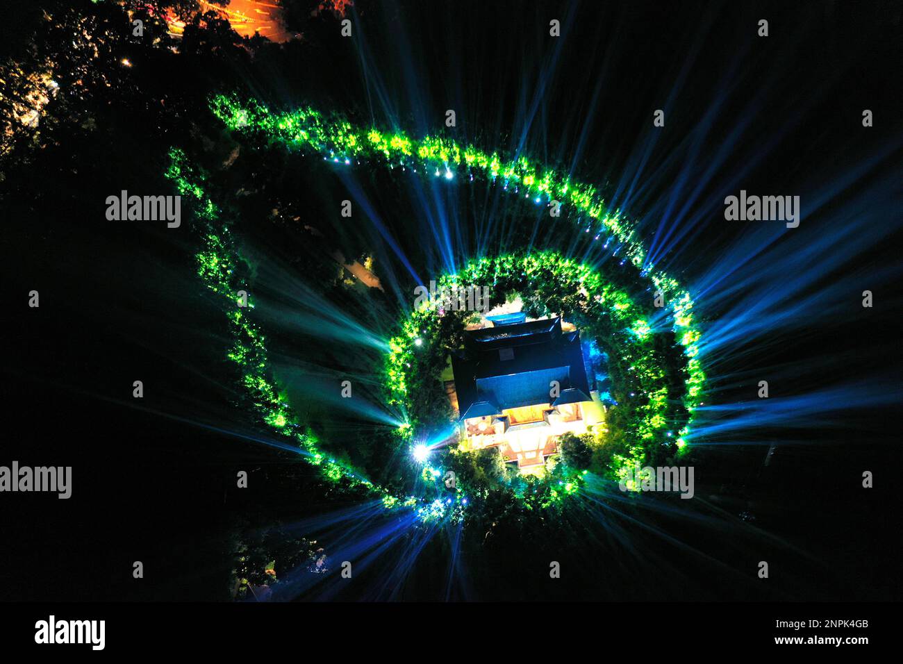 An aerial view of the illuminated Soong May-ling Palace and surrounding trees in Nanjing in east ...