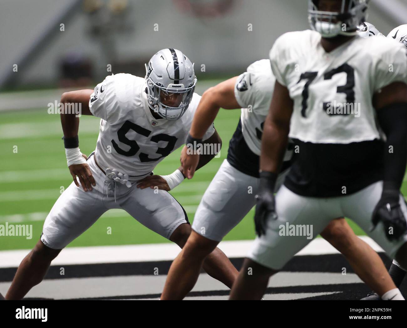 Las Vegas Raiders linebacker Javin White (53) warms up with teammates ...