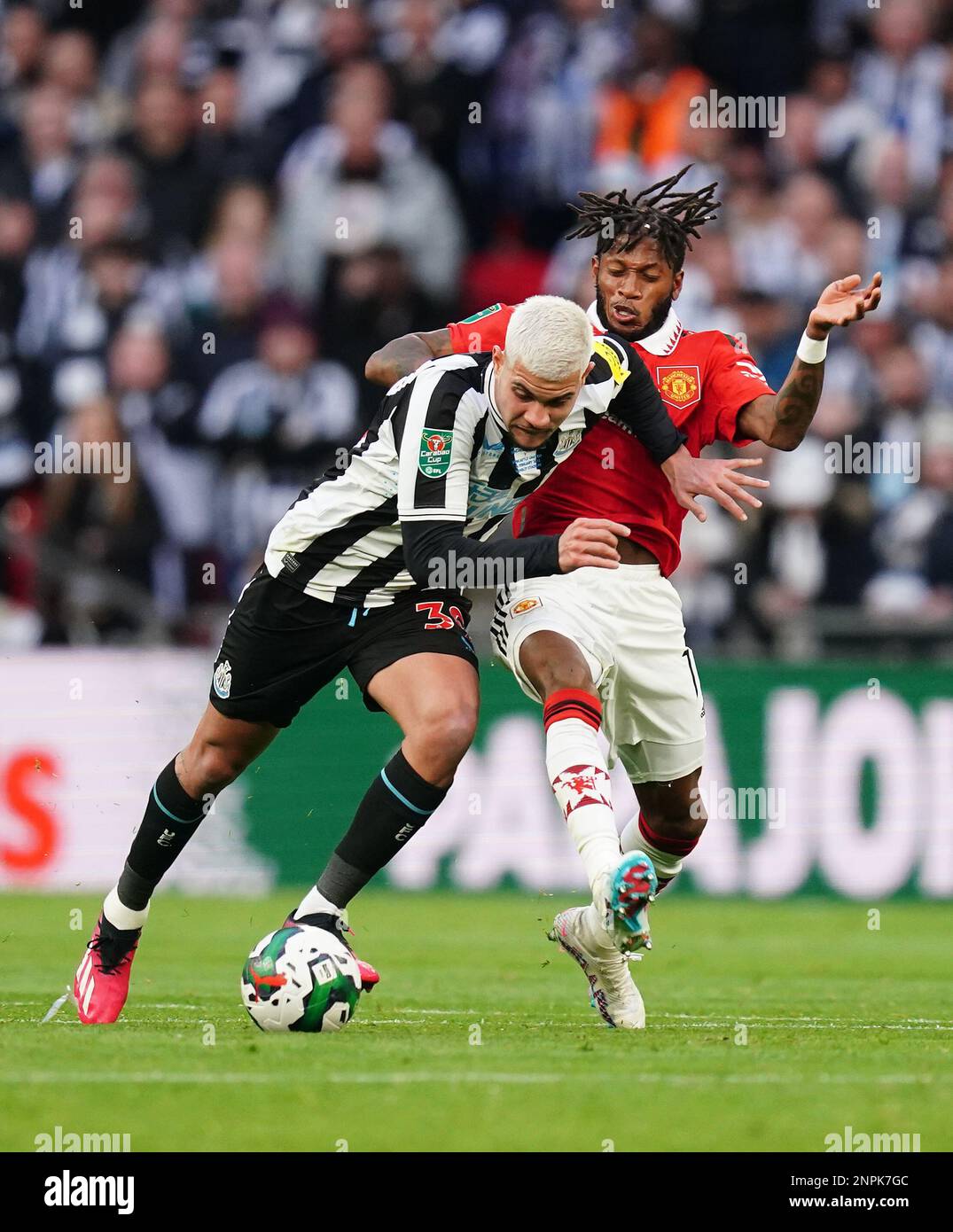 Manchester United's Fred (right) and Newcastle United's Bruno Guimaraes ...