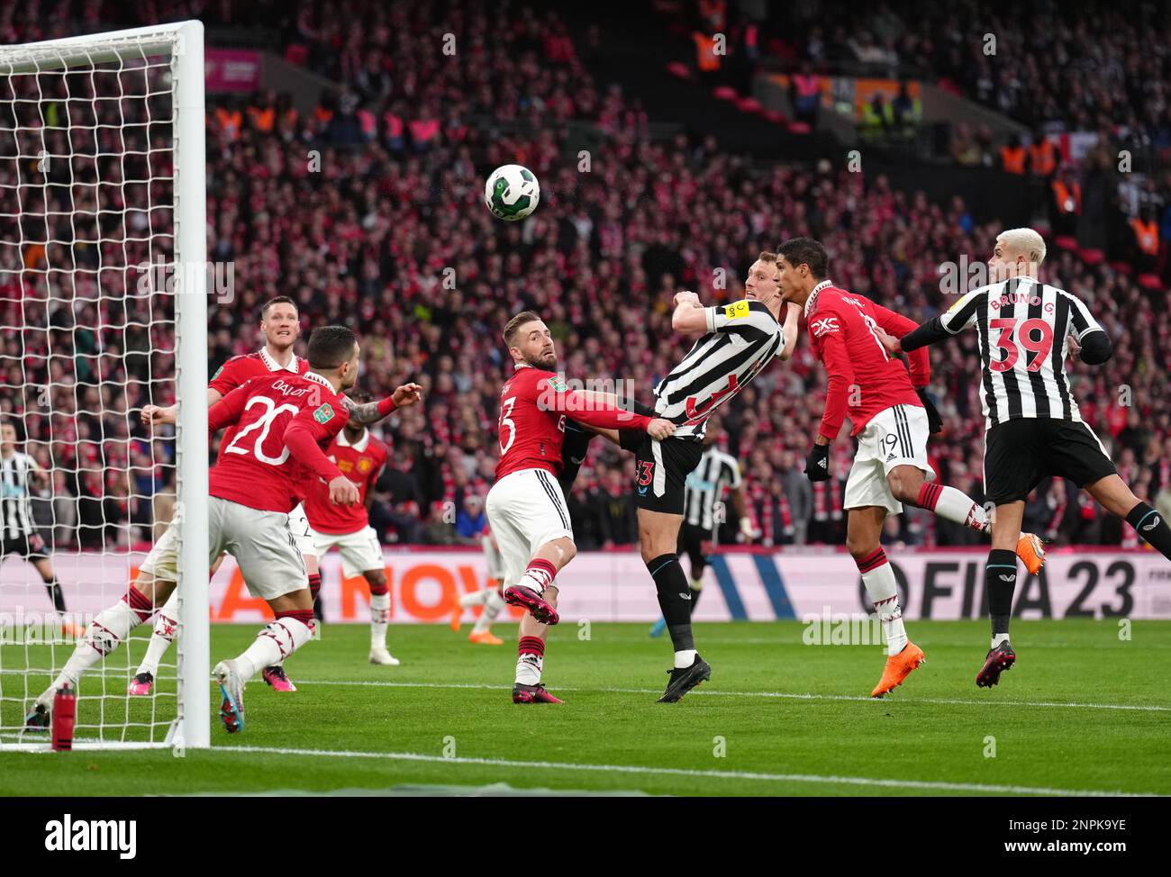 Newcastle United's Dan Burn (centre) heads towards goal during the ...