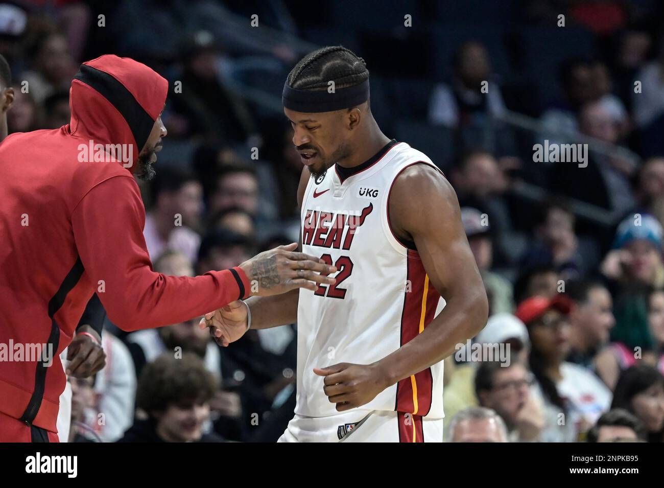 Miami Heat forward Jimmy Butler (22) and forward Udonis Haslem high five prior to an NBA ...