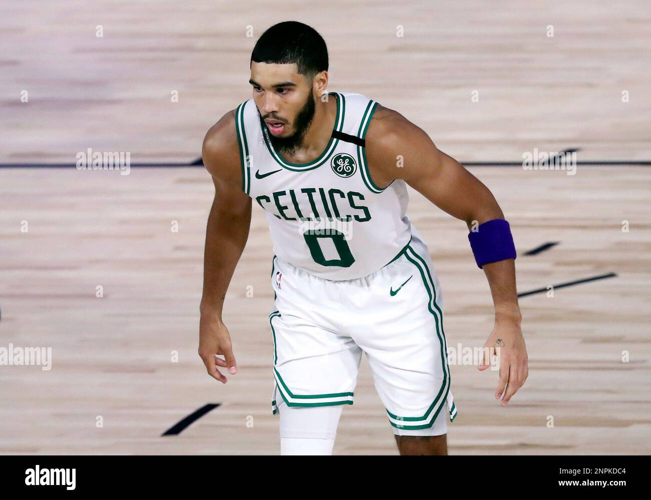 Boston Celtics forward Jayson Tatum (0) wears a purple armband in honor ...
