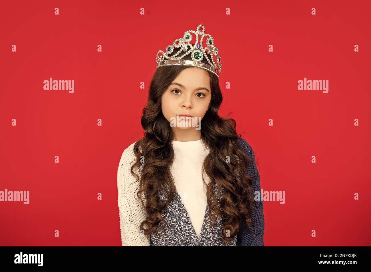 serious child in queen crown. expressing smug. arrogant princess in ...
