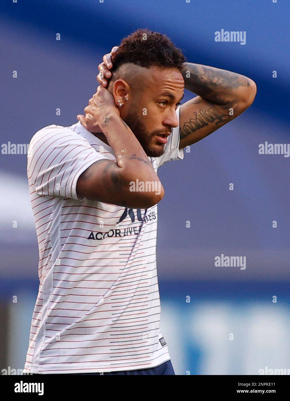 PSG's Neymar stretches during warm up before the Champions League final ...