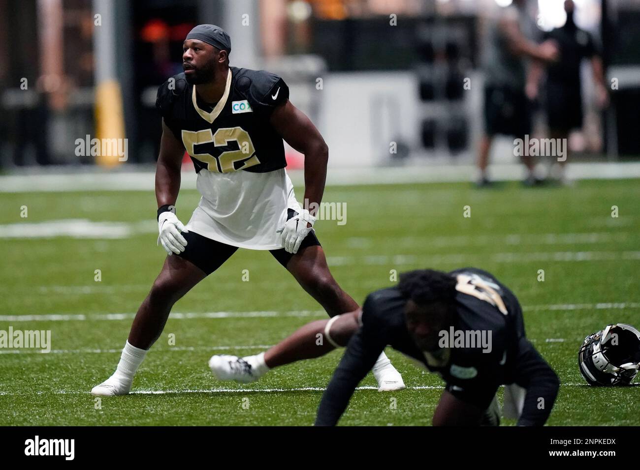 New Orleans Saints linebacker Craig Robertson (52) stretches during ...
