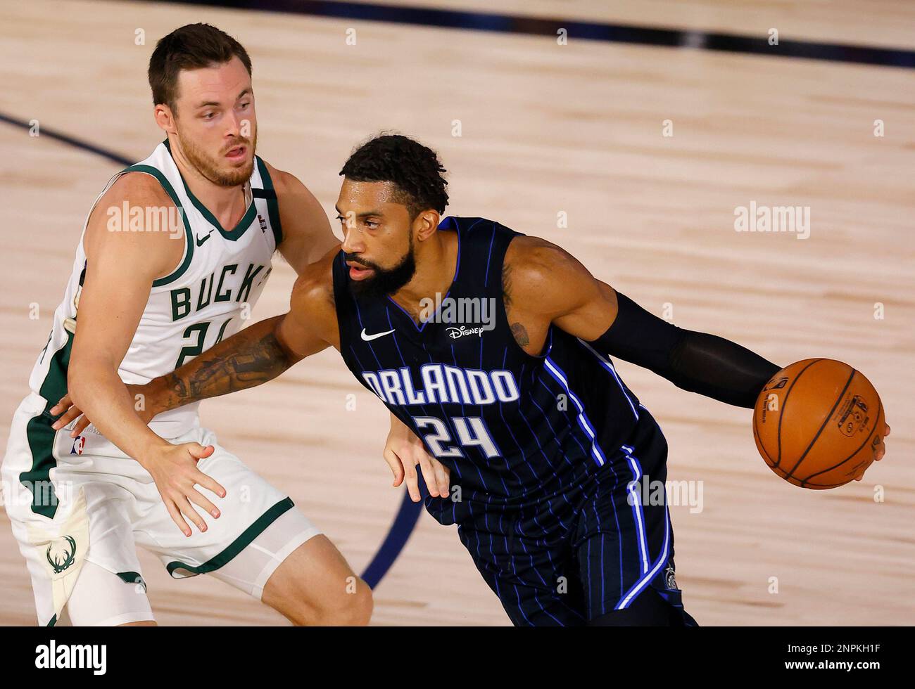 Orlando Magic's Khem Birch (24) drives against Milwaukee Bucks' Pat ...