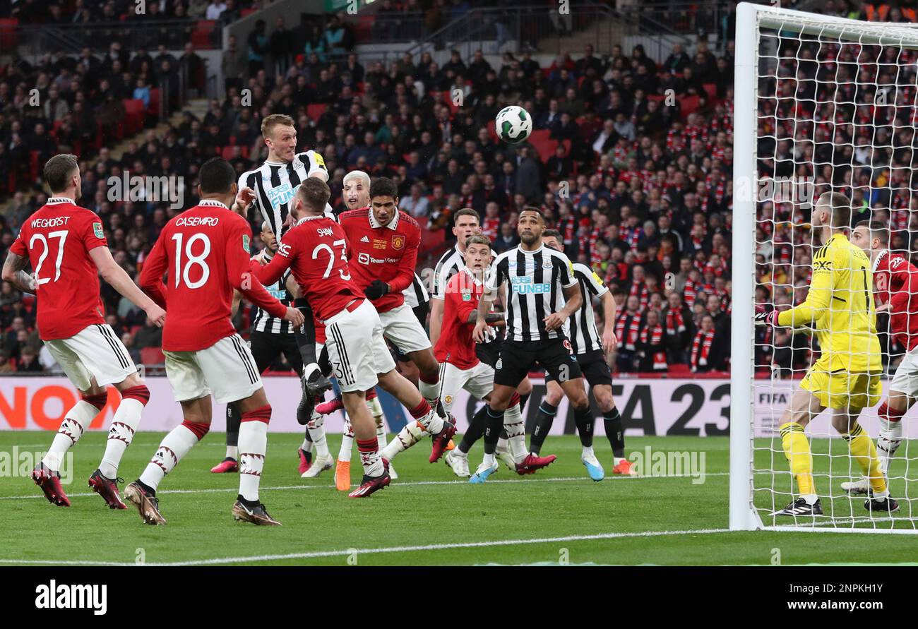 London, England, 26th February 2023. Dan Burn of Newcastle United heads ...