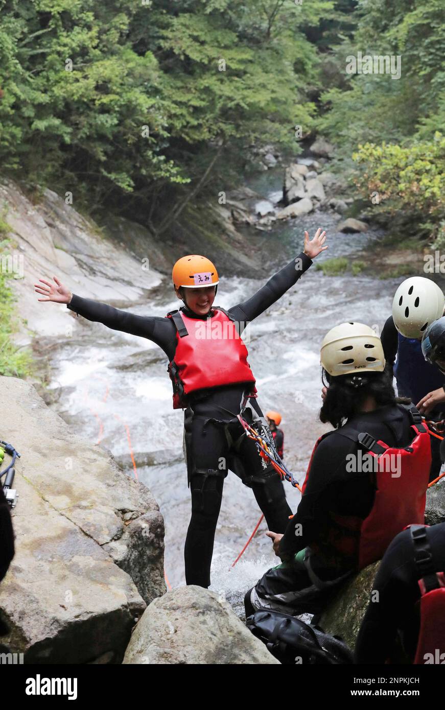 People enjoy canyoning at a river in Hitoyoshi City, Kumamoto ...