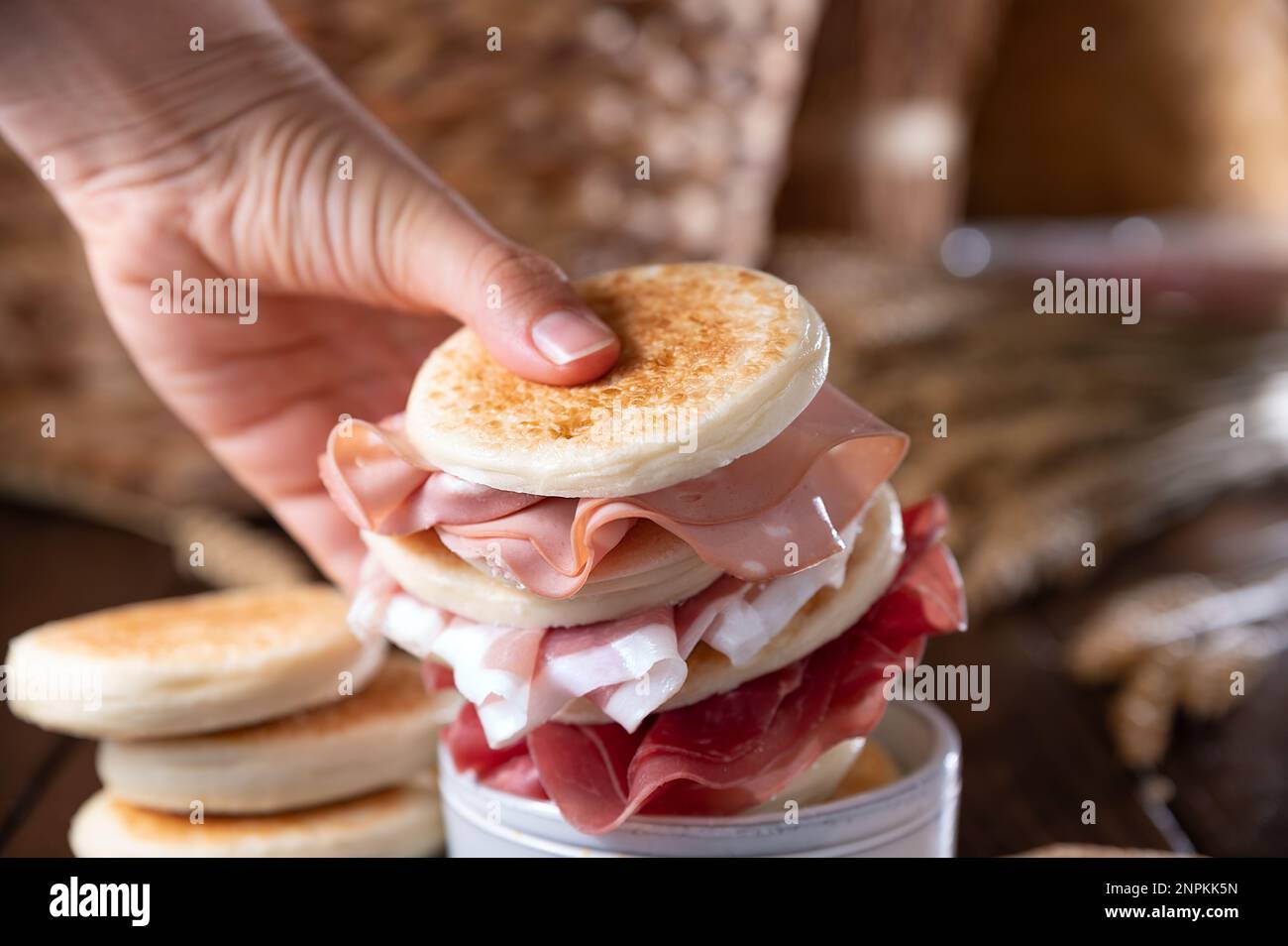 tigelle or crescentine homemade, con prosciutto, salame, stracciatella ...