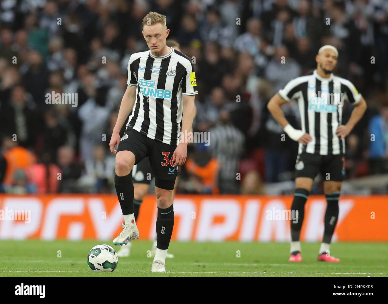 London, England, 26th February 2023. Sean Longstaff of Newcastle United looks dejected after ...