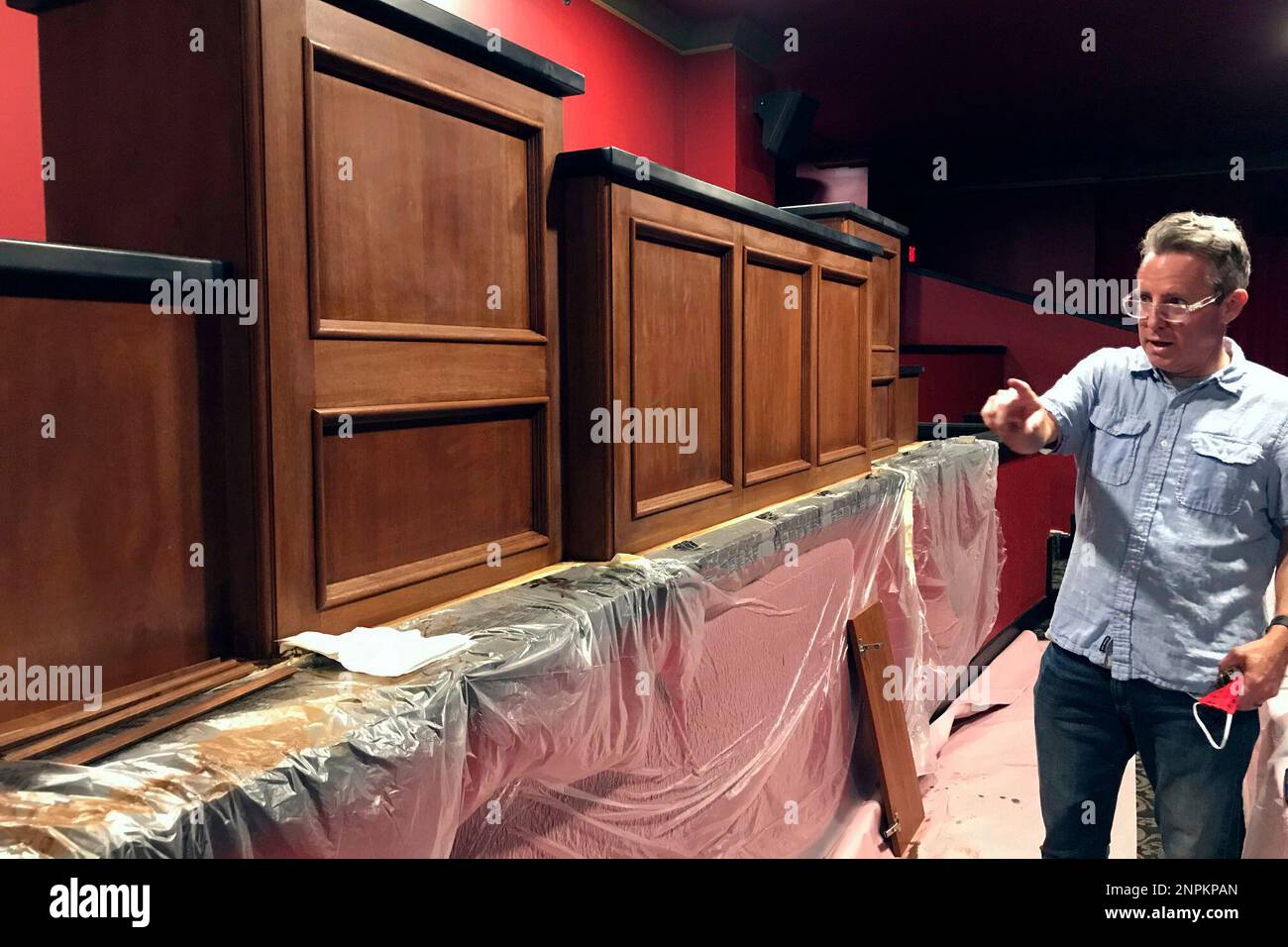 In this recent photo, World Theatre Board President Mark Orr speaks ...