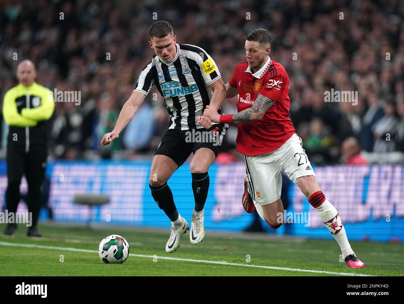 Newcastle United's Sven Botman (left) and Manchester United's Wout ...