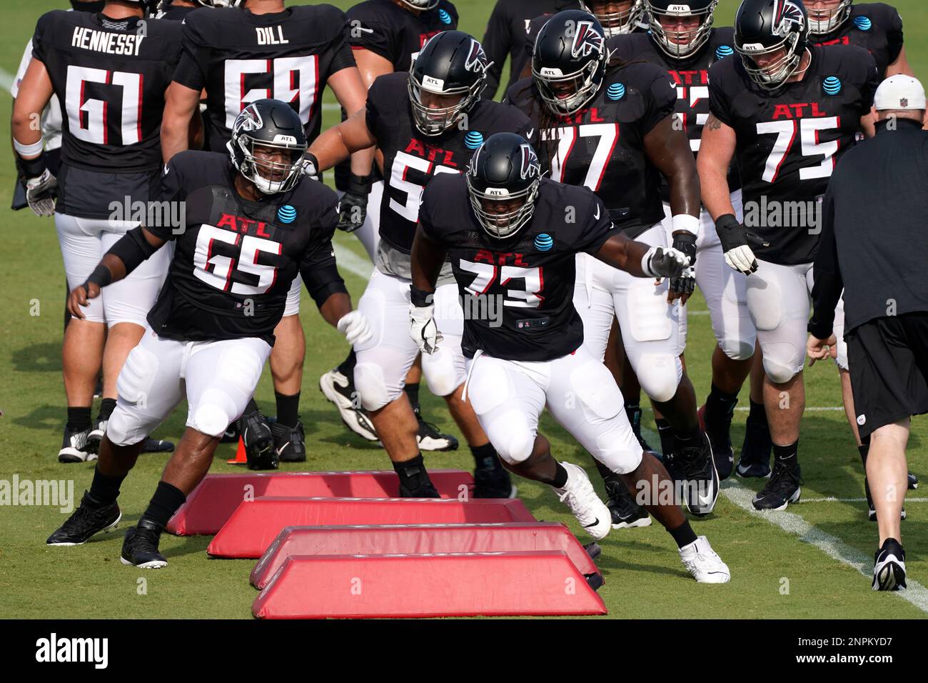 Atlanta Falcons offensive tackle Matt Gono (73) and guard Justin McCray ...